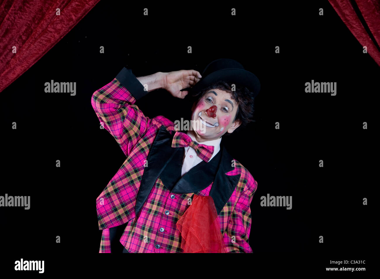 Clown waving hi-res stock photography and images - Alamy