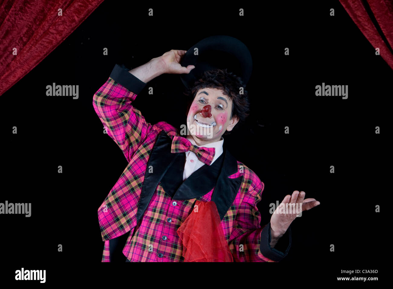 Clown waving hi-res stock photography and images - Alamy