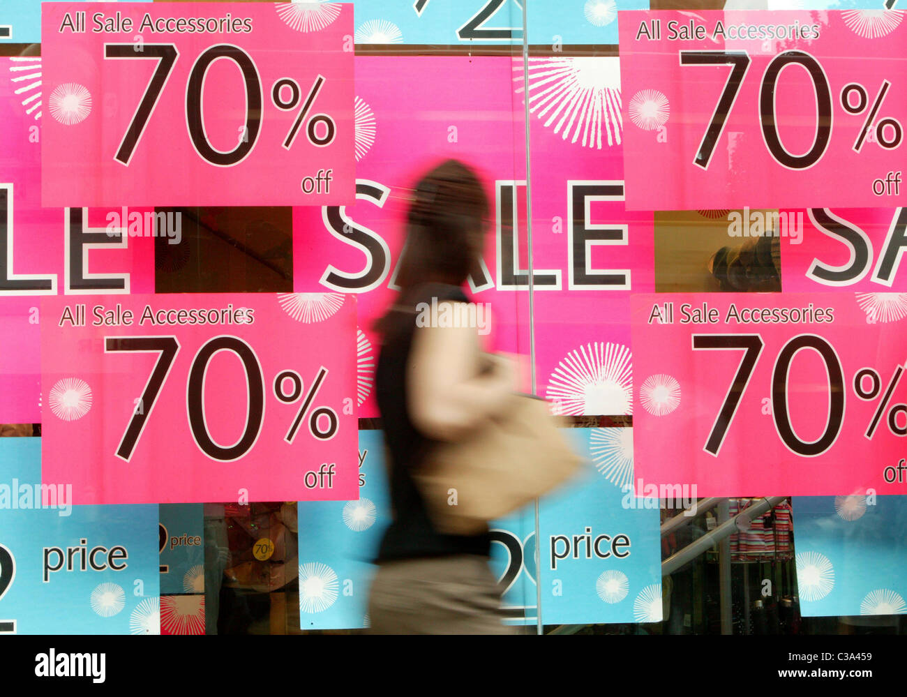 Woman walks past customer hi-res stock photography and images - Alamy