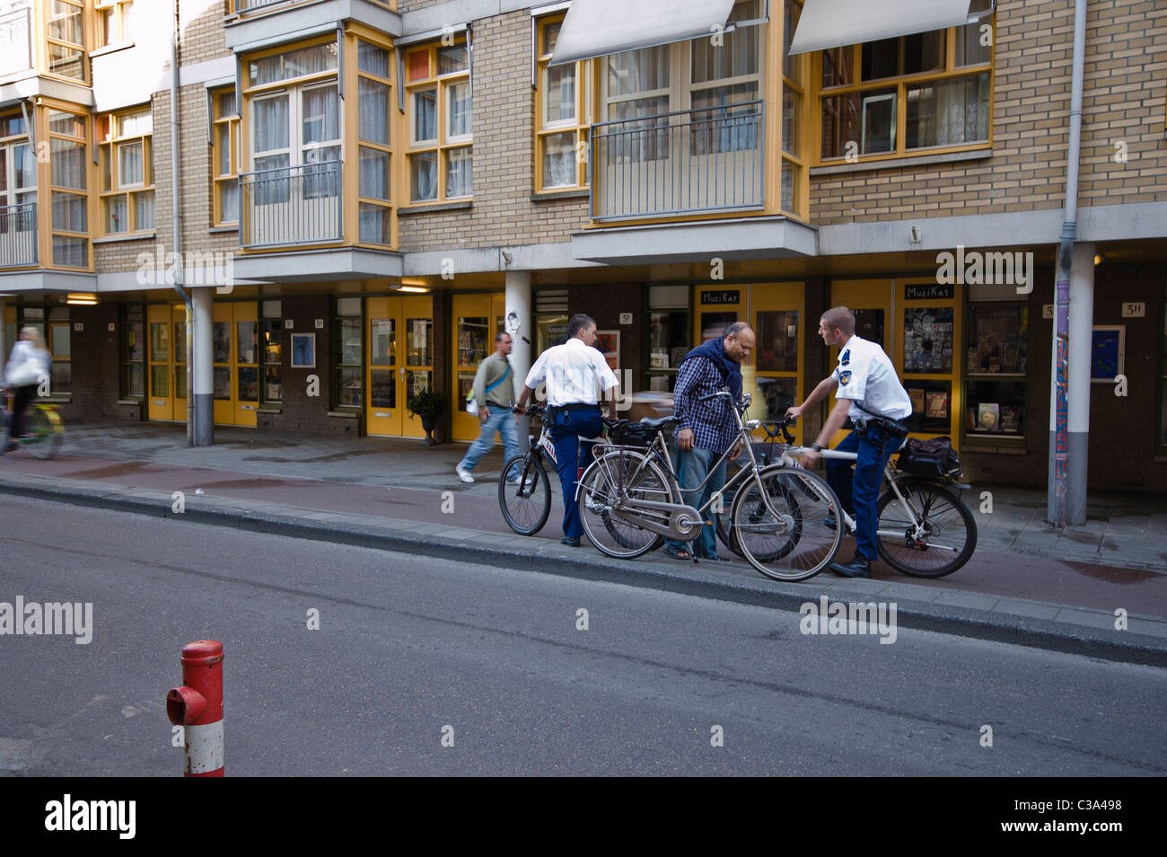 Police on cycles hi-res stock photography and images - Alamy