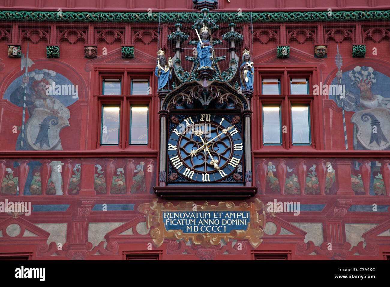 The facade of Basel's Town Hall (Rathaus) with the famous clock and ...