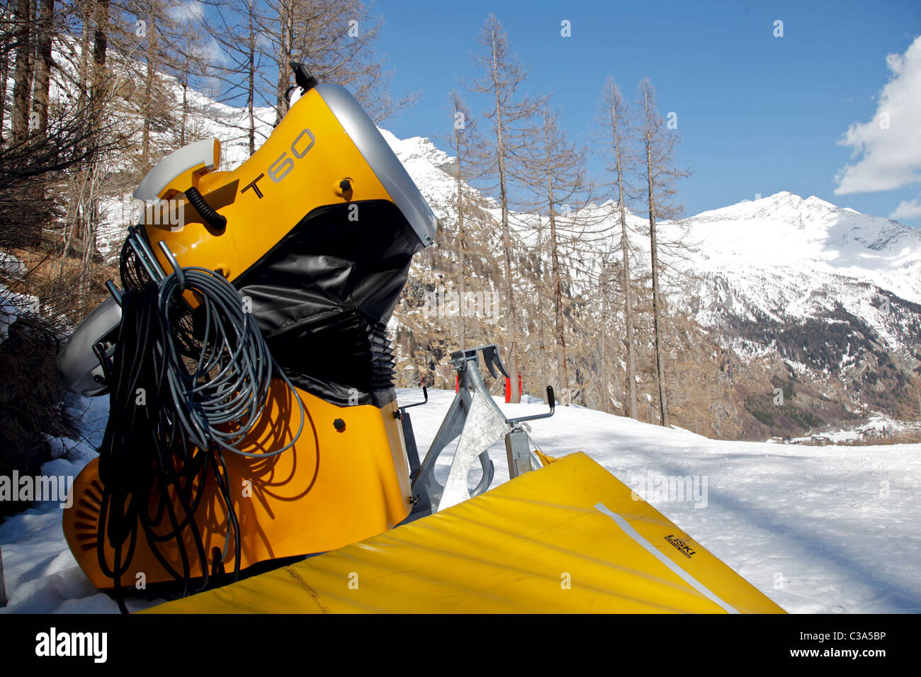 A brand new snow gun near a skiing trail Stock Photo - Alamy