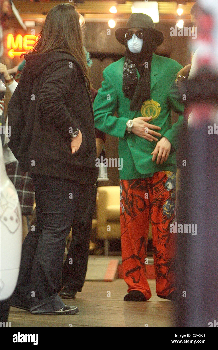 Michael Jackson goes shopping at Ed Hardy with his children while ...