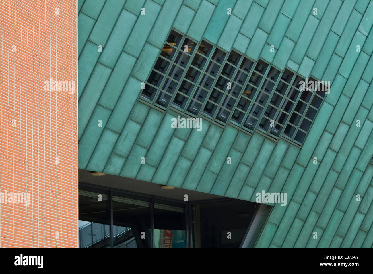 Slanting wall and windows Stock Photo - Alamy