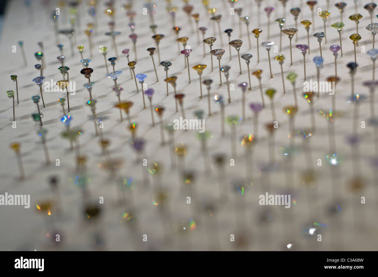 colored diamonds on display Stock Photo - Alamy