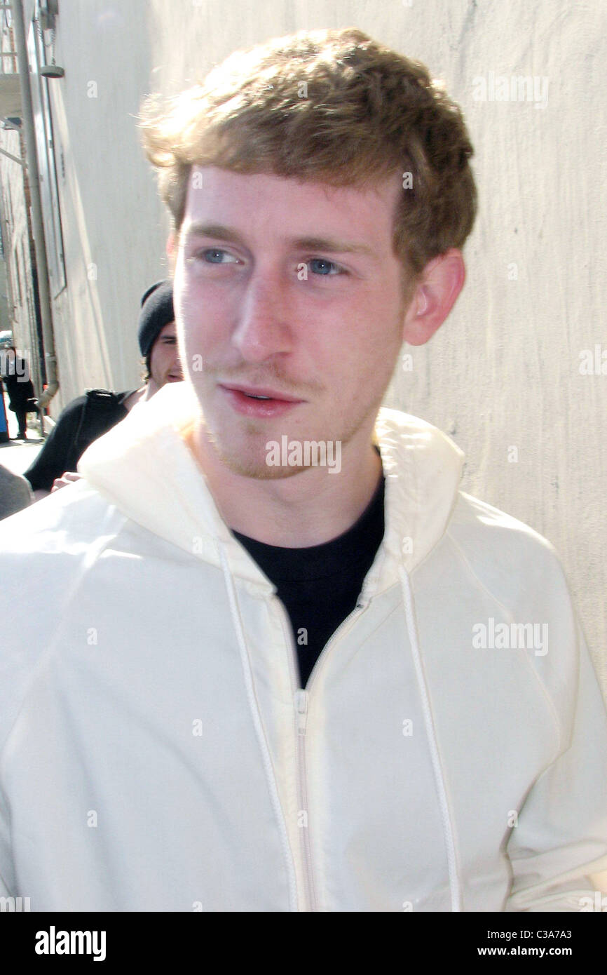 American rapper Asher Roth signs autographs after performing his hit ...