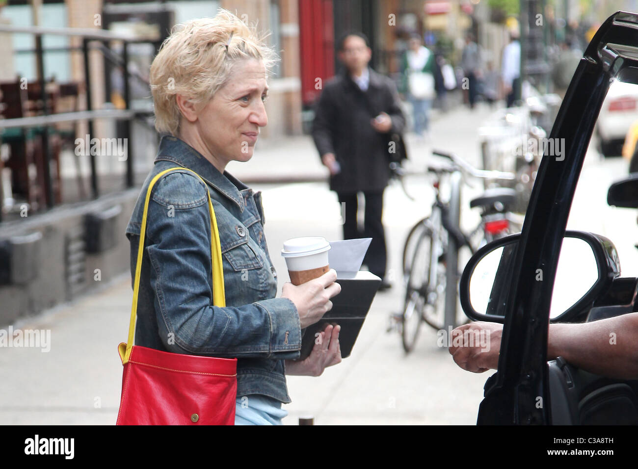 The Sopranos' co-star Edie Falco enjoying coffee while out and about in ...