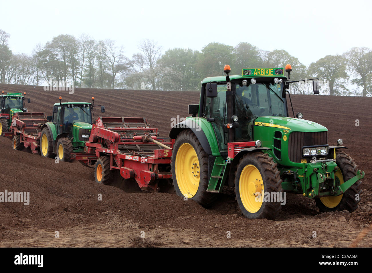Preparing soil for potato crop sowing Montrose Scotland Stock Photo - Alamy