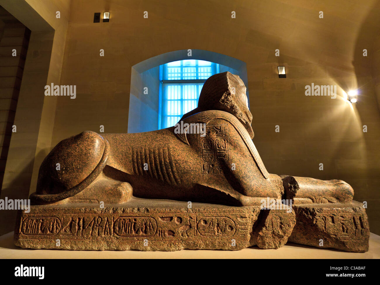 A pink granite Egyptian Sphinx in the Louvre Museum, Paris Stock Photo ...