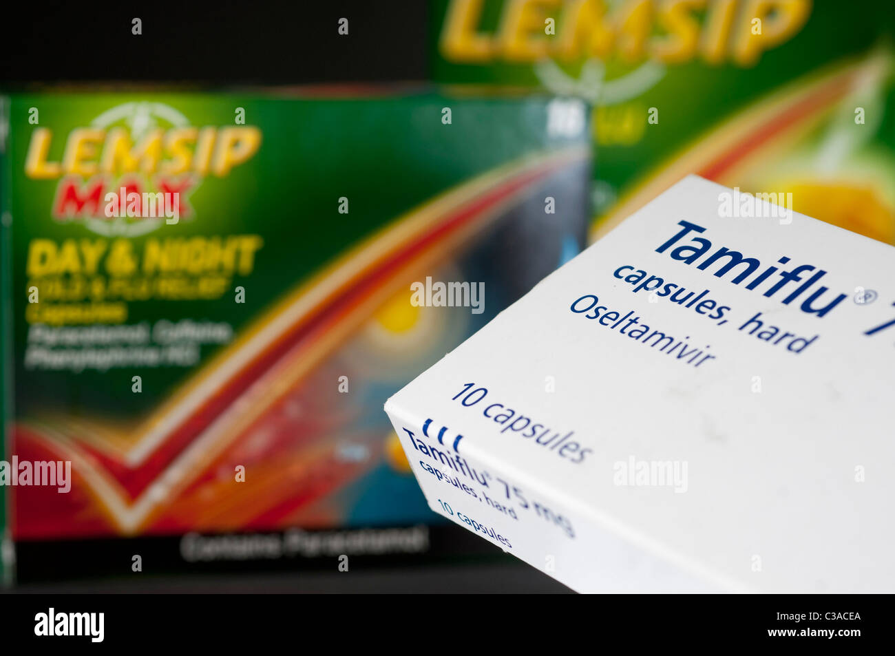 Illustrative image of Tamiflu 75mg capsules and Lemsip tablets Stock ...