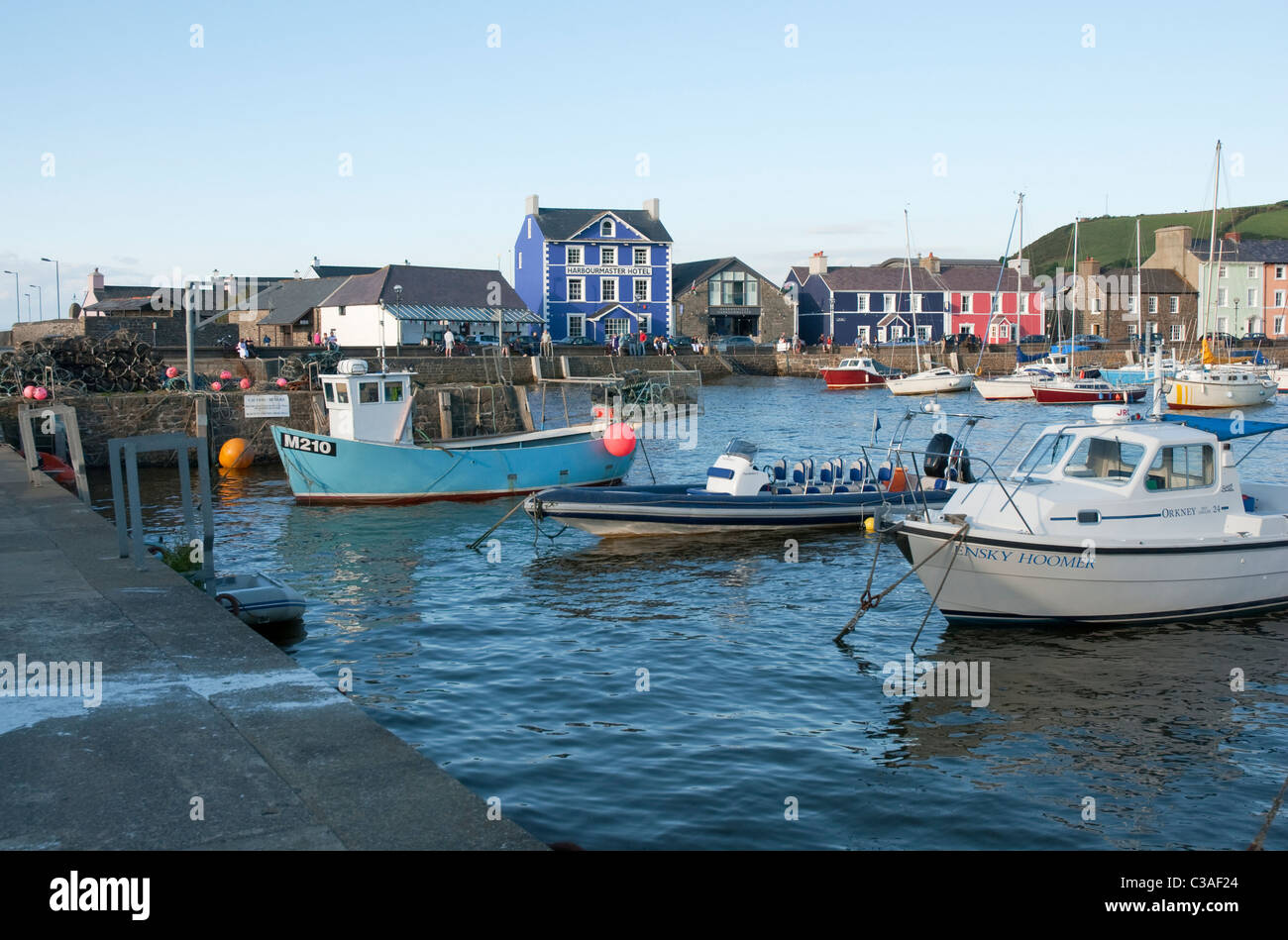 Aberaeron harbour fishing boats sailing irish sea hi-res stock ...