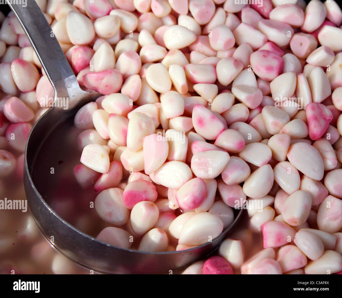 garlic pickled vinegar pattern food texture pink Stock Photo - Alamy