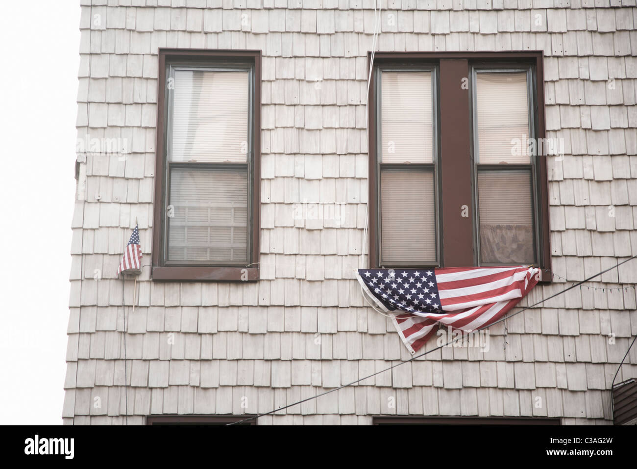 American flag hanging from window. Brooklyn. New York City. USA Stock ...