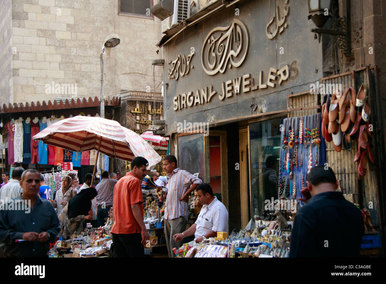 Souvenir stalls in front of a jewelery shop in Khan al-Khalili market ...