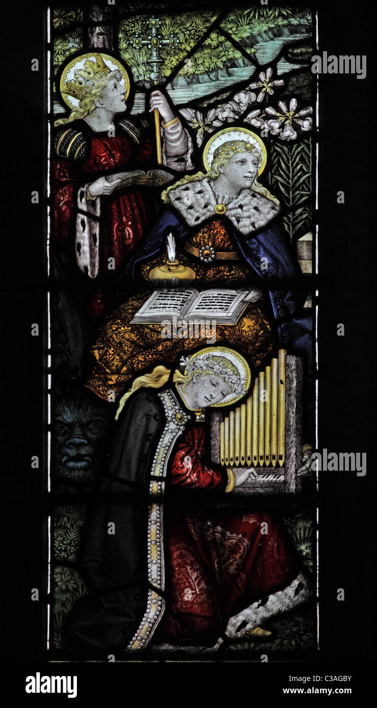 A Stained glass window by the Kempe Studios, depicting female saints ...