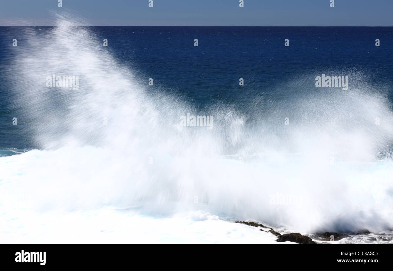 Waves splashing at Hawaiian coast Stock Photo - Alamy