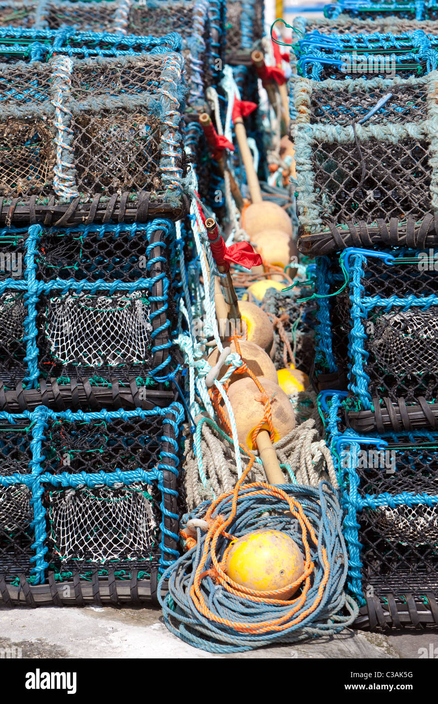 Stacked Creels ready for fishing. Gourdon harbour. Scotland Stock Photo ...