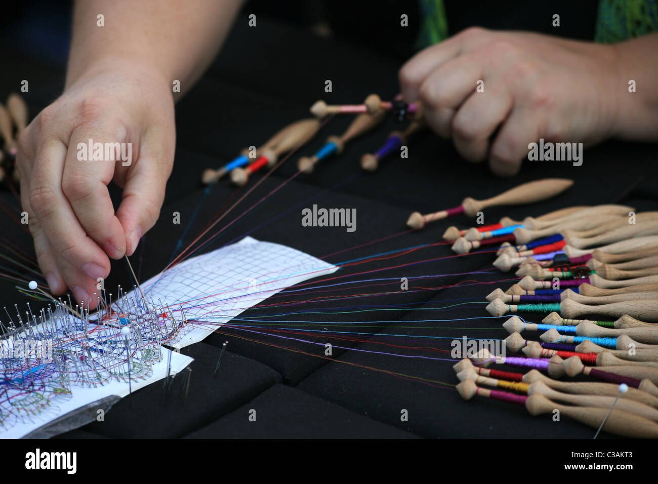 Old woman doing embroidery hi-res stock photography and images - Alamy
