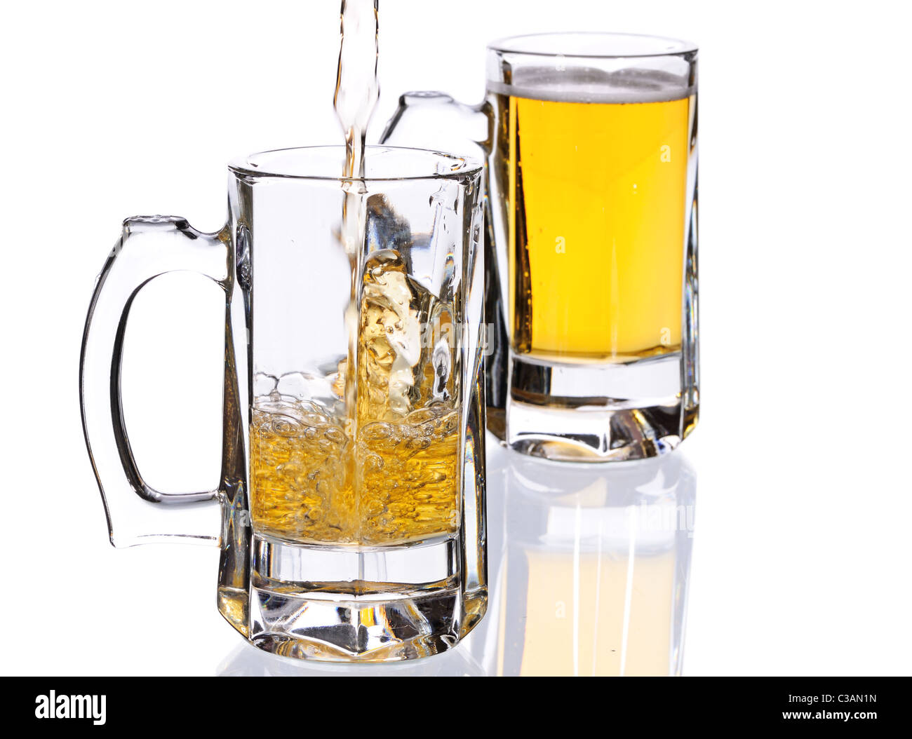 Close up two glass mugs hi-res stock photography and images - Alamy