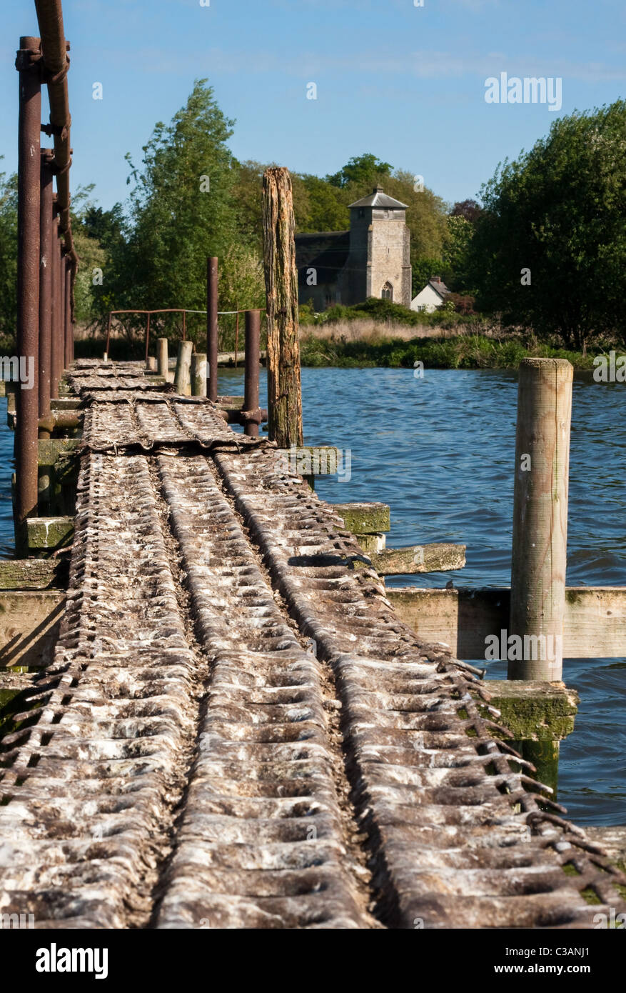 View of Great Livermere Church (St Peter's) from a pier on Ampton water ...