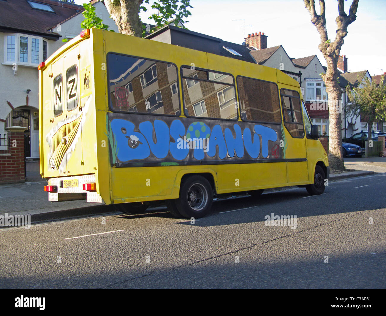 Old school bus decorated with graffiti Stock Photo - Alamy