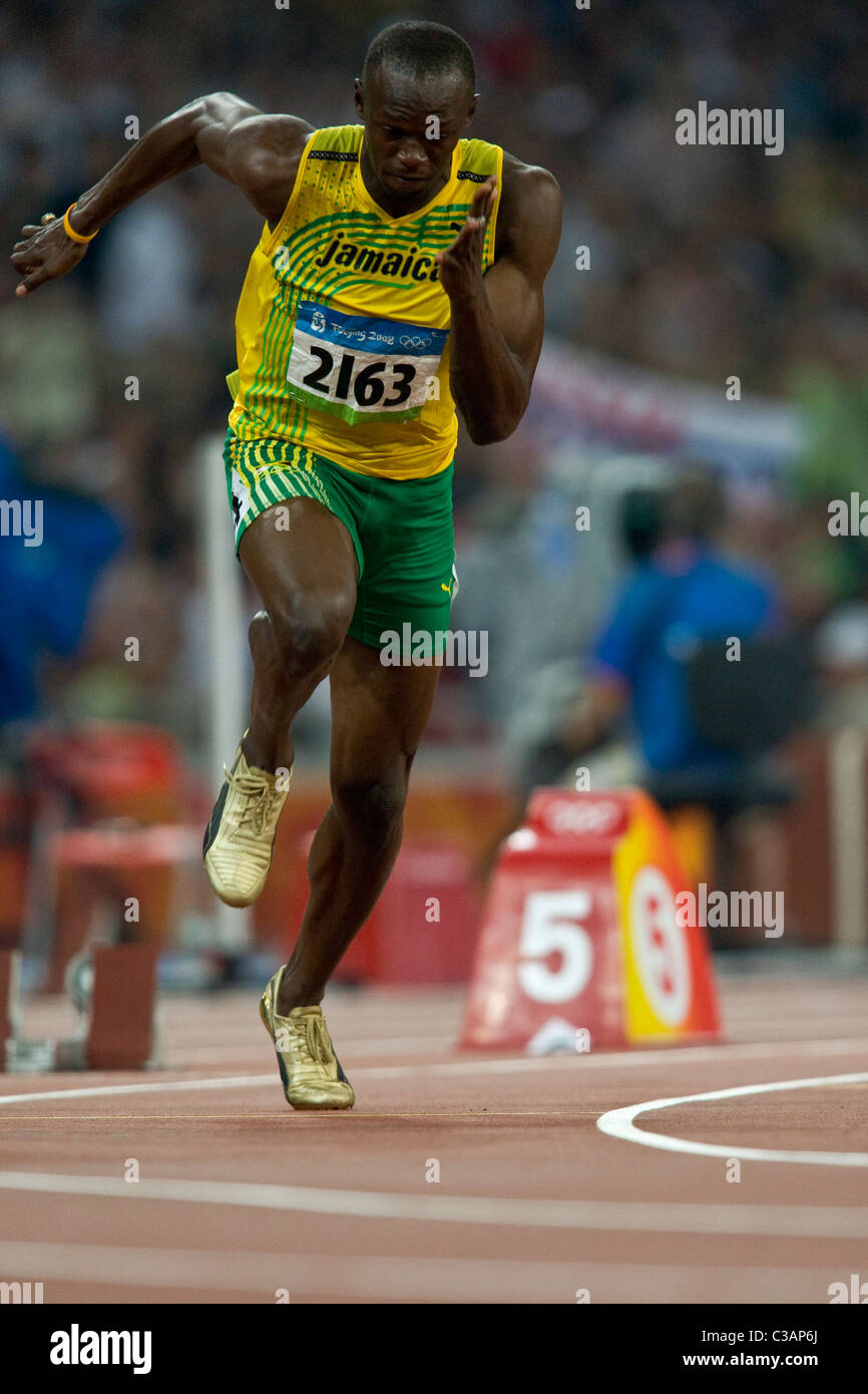 Usain Bolt (JAM) competing in the 200m at the 2008 Olympic Summer Games ...