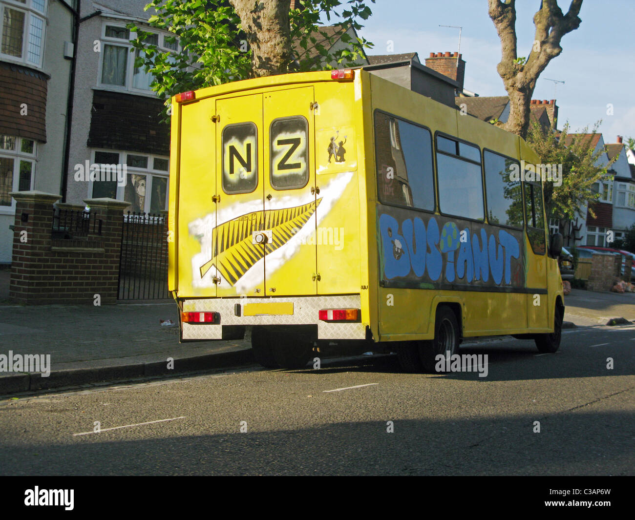 Old school bus decorated with graffiti Stock Photo - Alamy