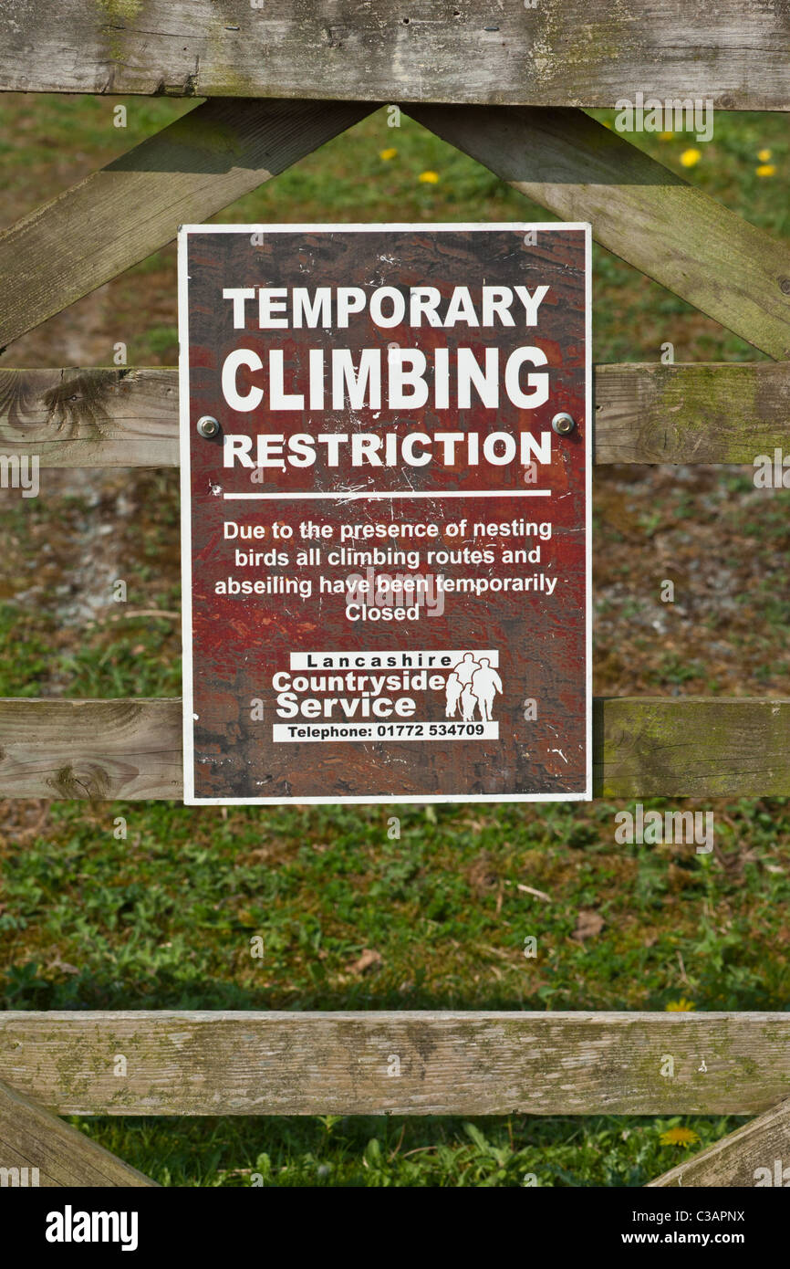 Climbing restriction sign due to nesting birds, Lancashire Stock Photo ...