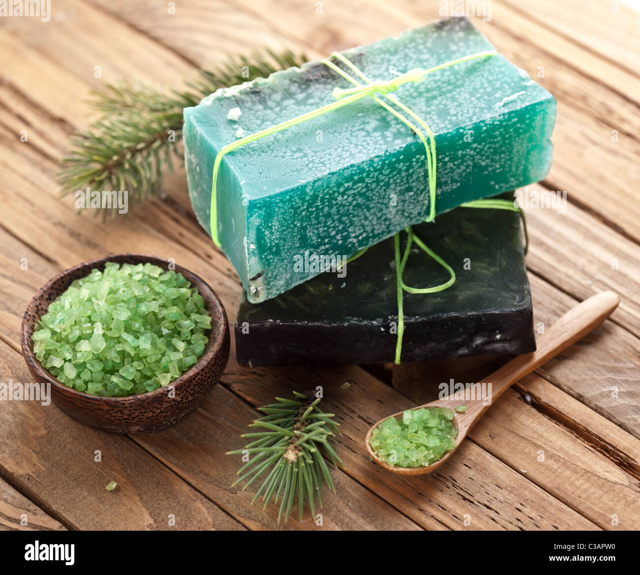 Pine soap with sea-salt and branch of pine Stock Photo - Alamy