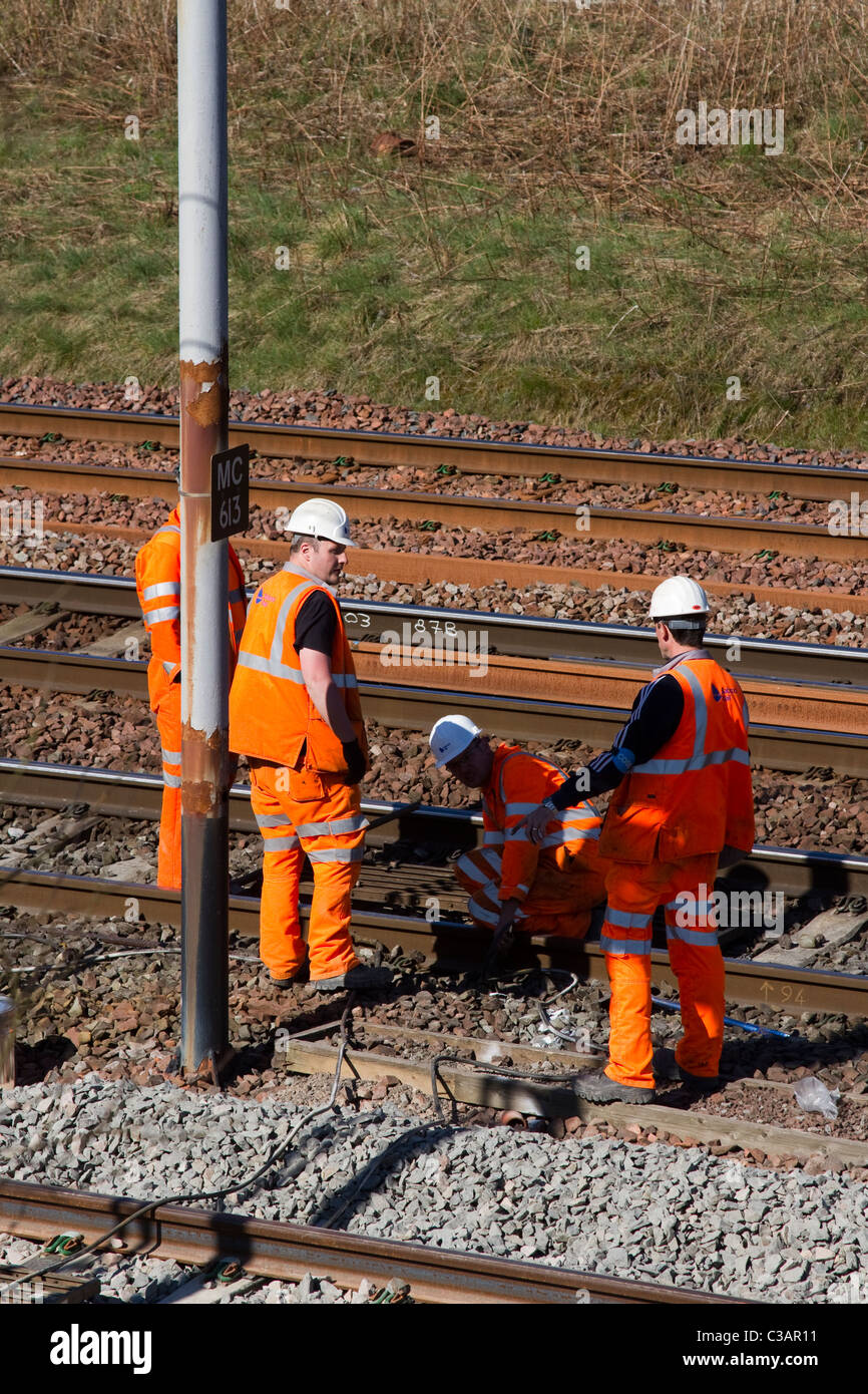 Babcock Rail Engineers repairing railway train lines at Beattock Summit ...