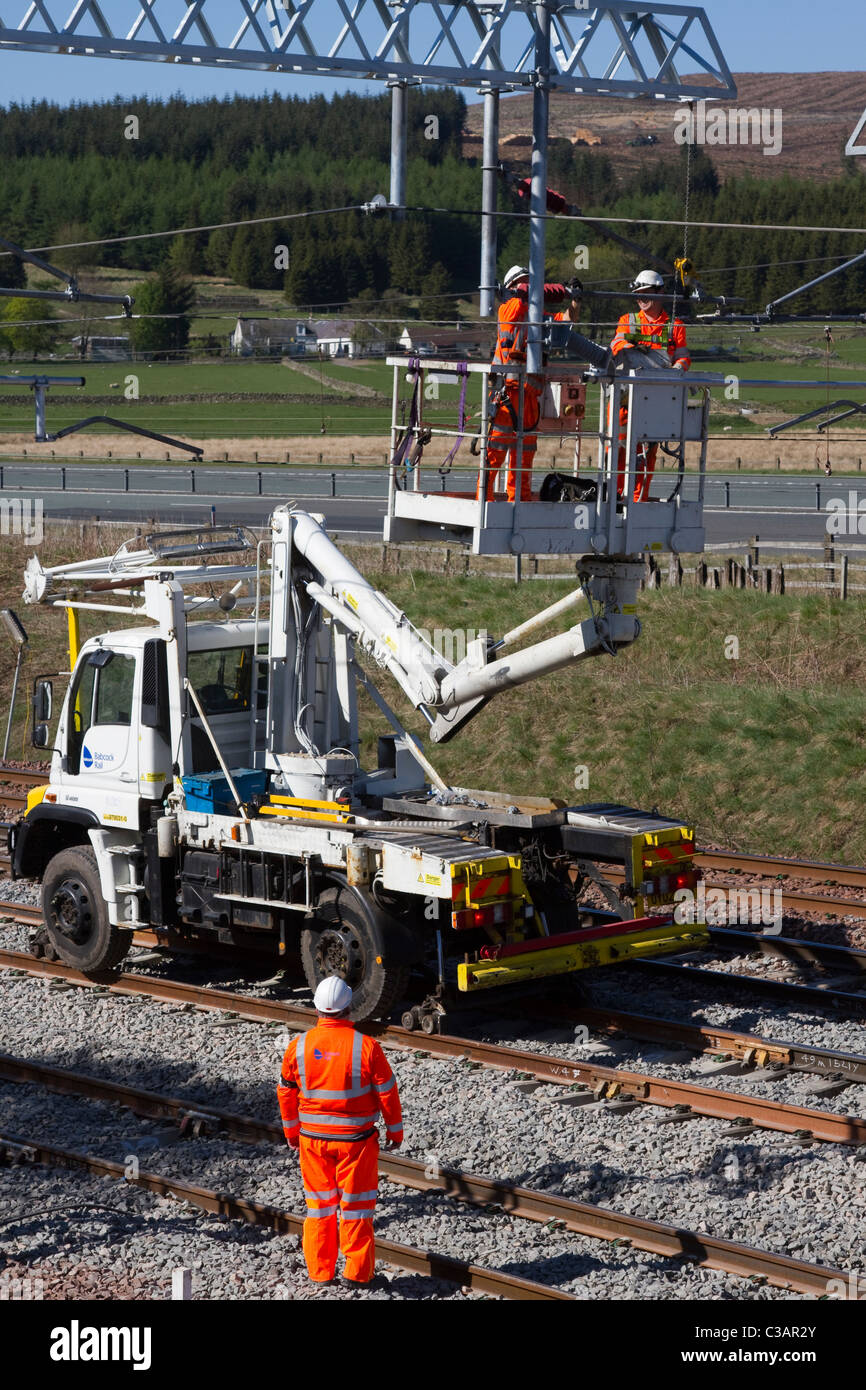 Babcock Rail Engineers repairing railway train lines at Beattock Summit ...