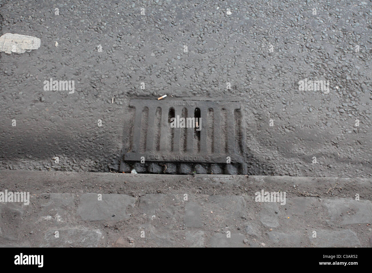 Blocked surface water drain gully showing the issues with such drainage ...