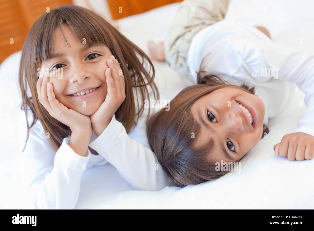 portrait of two smiling young girls Stock Photo - Alamy