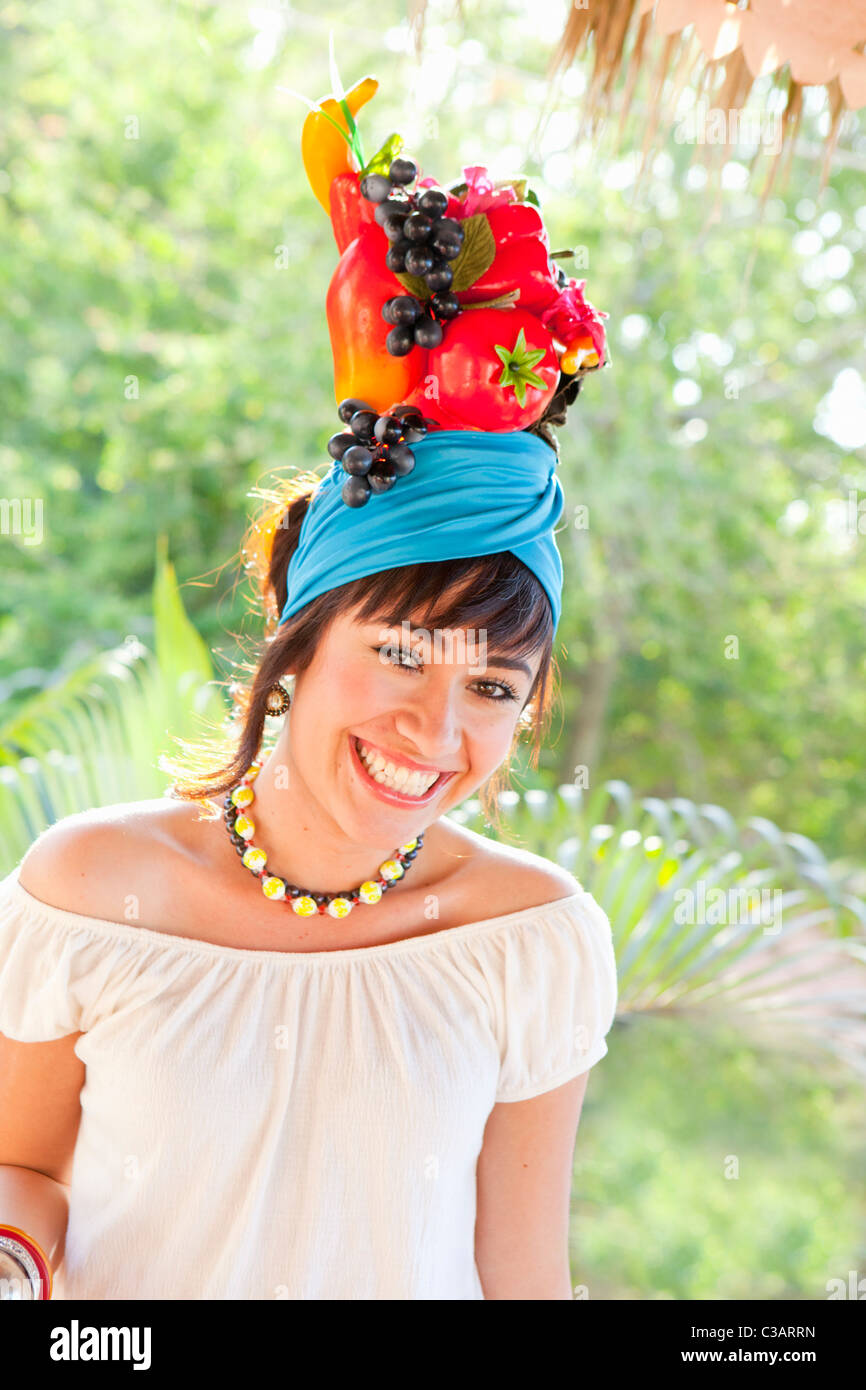 young woman wearing fruit hat Stock Photo - Alamy