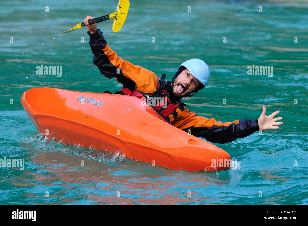 Kayaker fooling around in the water. Soca river valley Stock Photo - Alamy