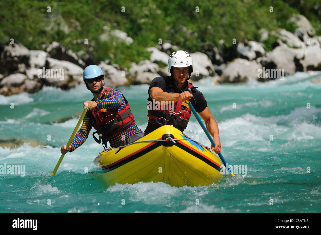 Two rafters on a mini raft, Soca river, Slovenia Stock Photo - Alamy