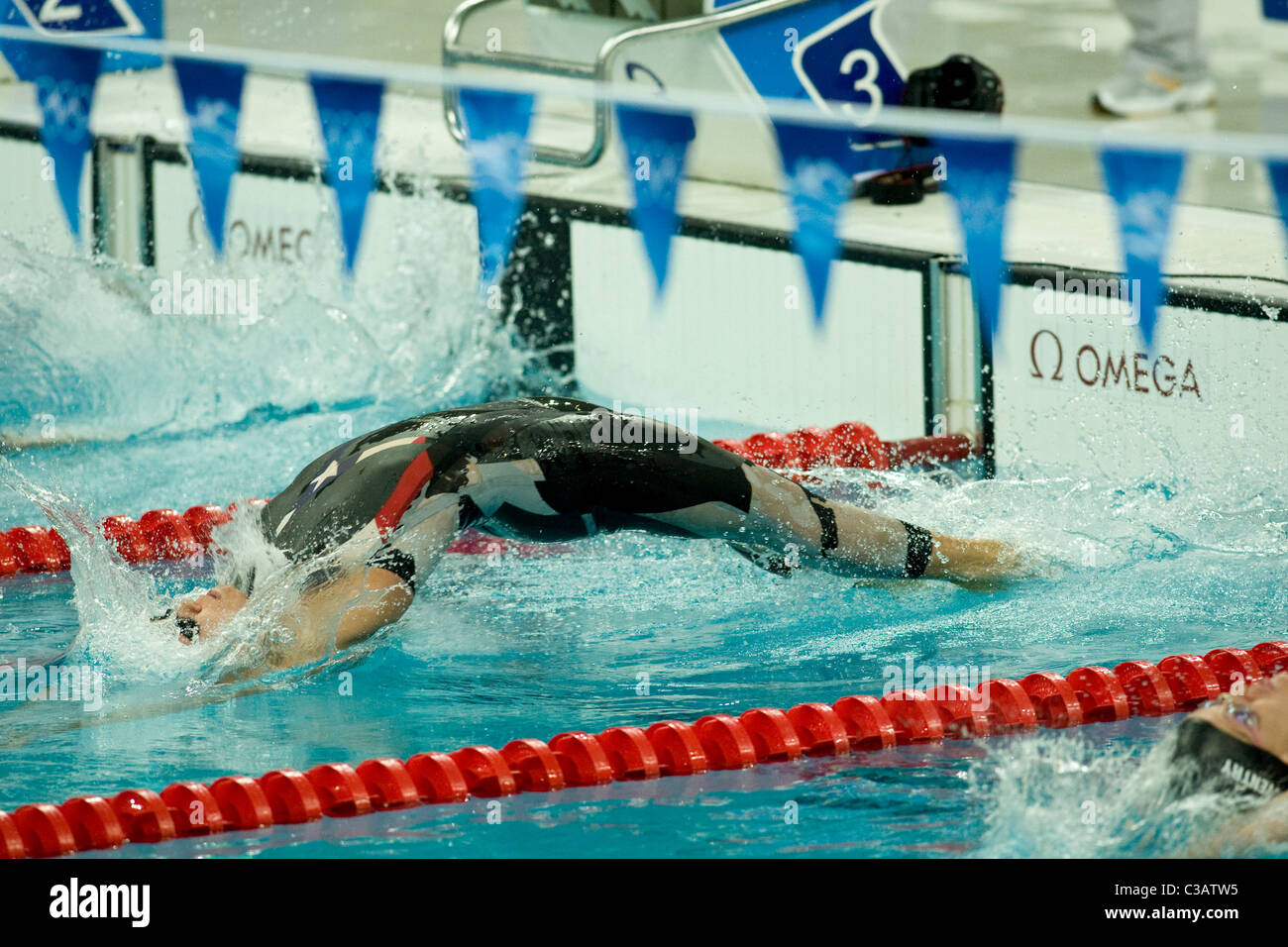 Swimming woman 100m backstroke heats hi-res stock photography and ...