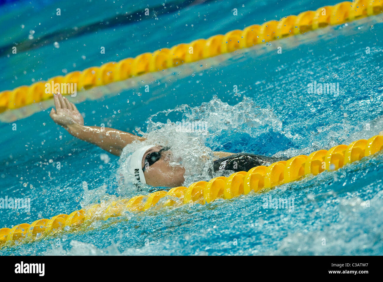 Natalie Coughlin (USA) competing in the 100m backstroke heats in the ...