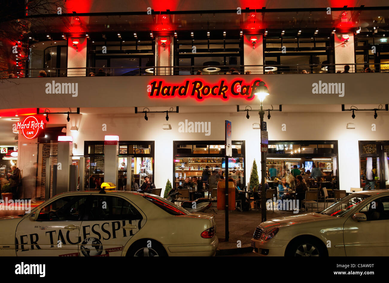 Berlin, the Hard Rock Cafe, sidewalk cafe, many tourists, at night. D ...