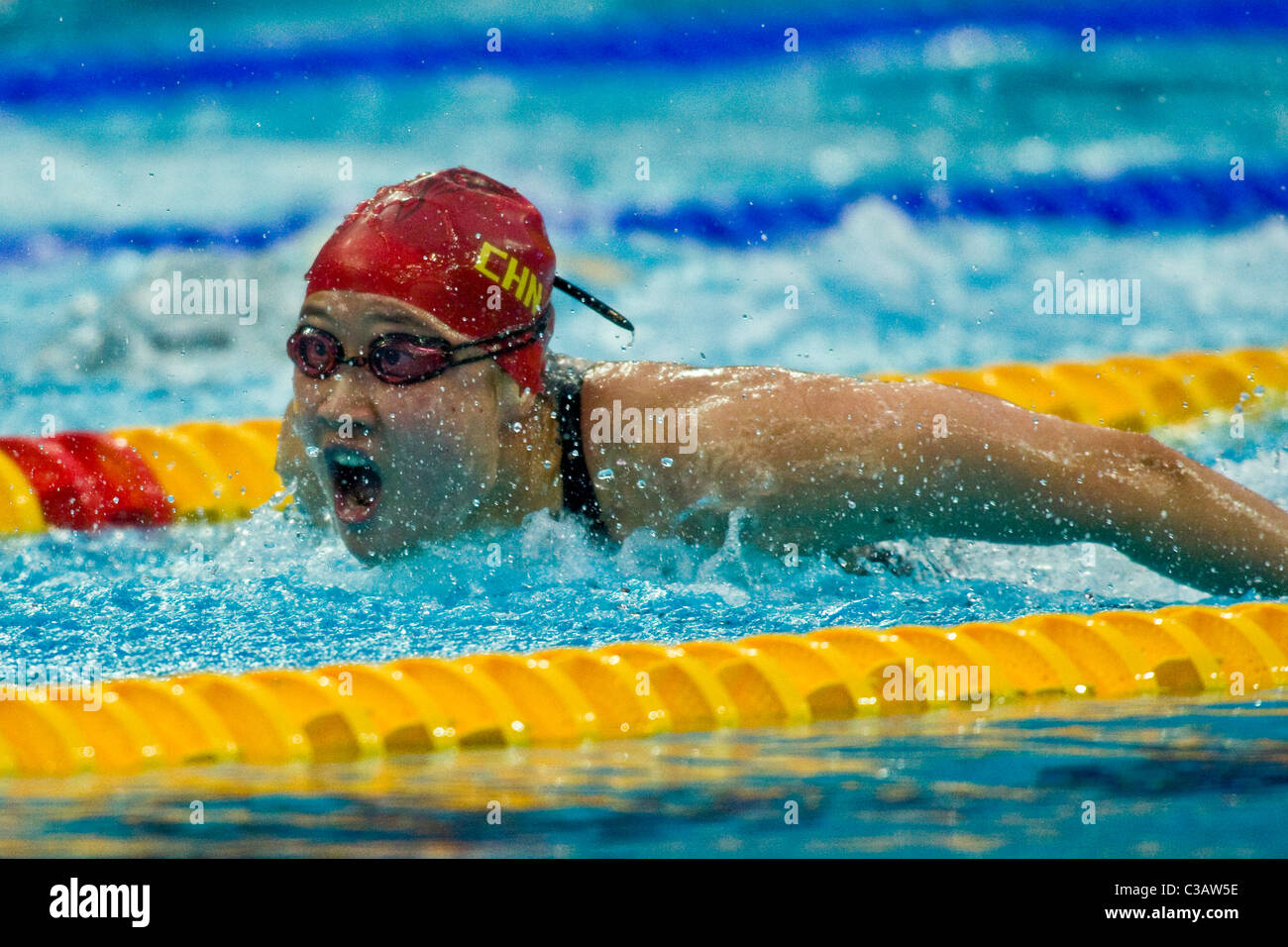 Liu Zige (CHN) competing in the 200m butterfly swimming competition at ...