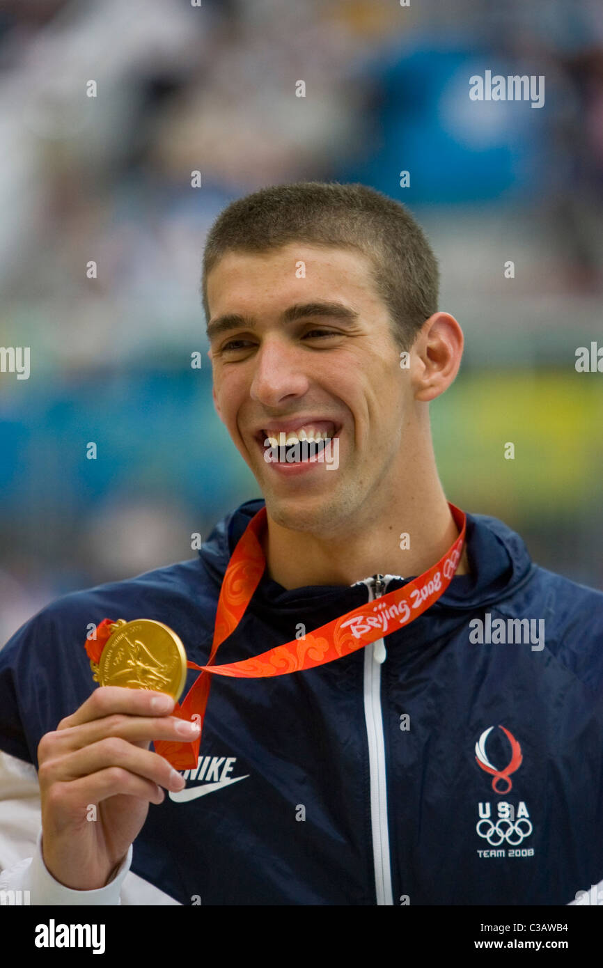 Michael Phelps winner of the gold medal in the 100m butterfly at the ...