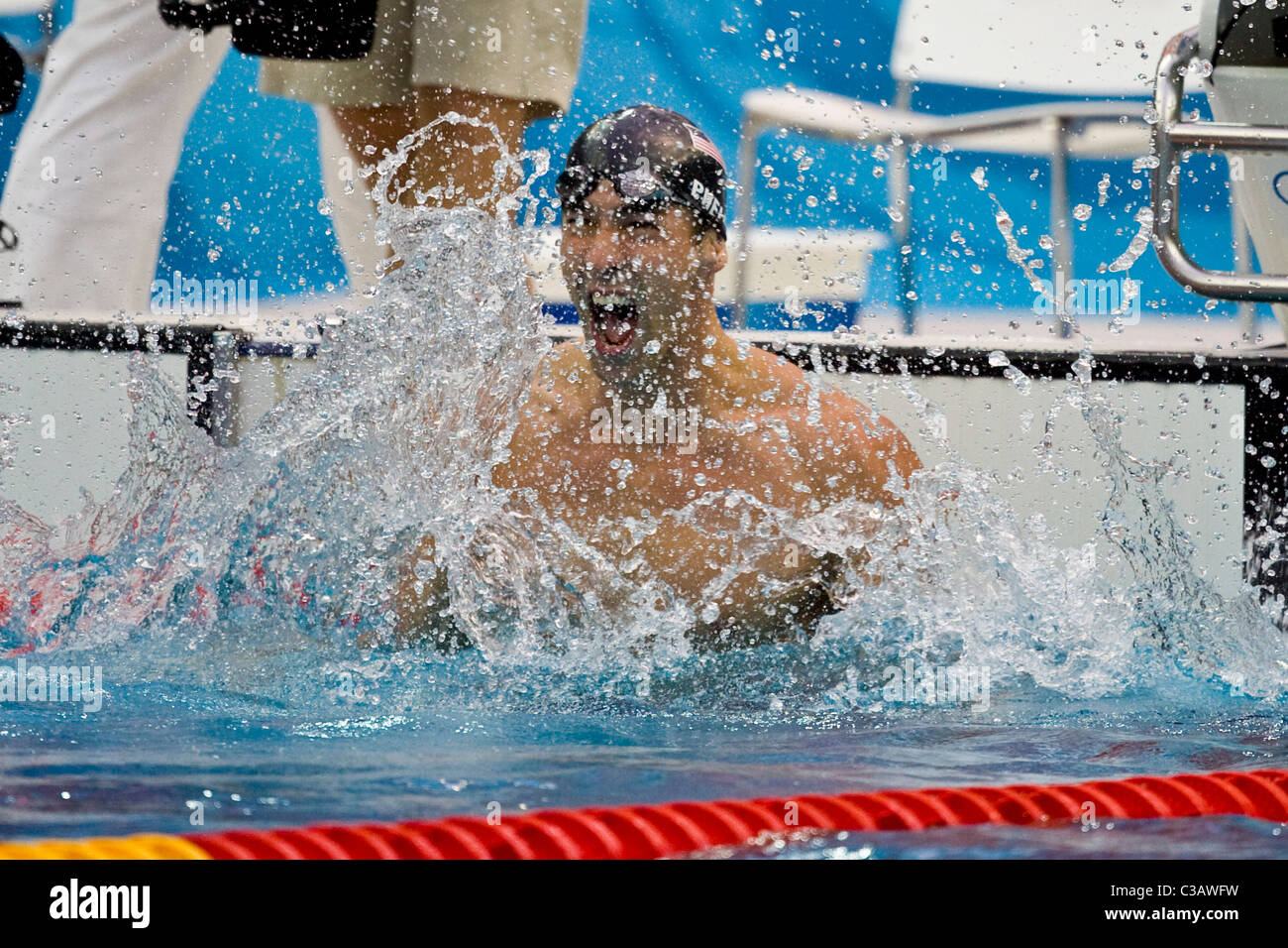 Michael Phelps winner of the gold medal in the 100m butterfly at the ...
