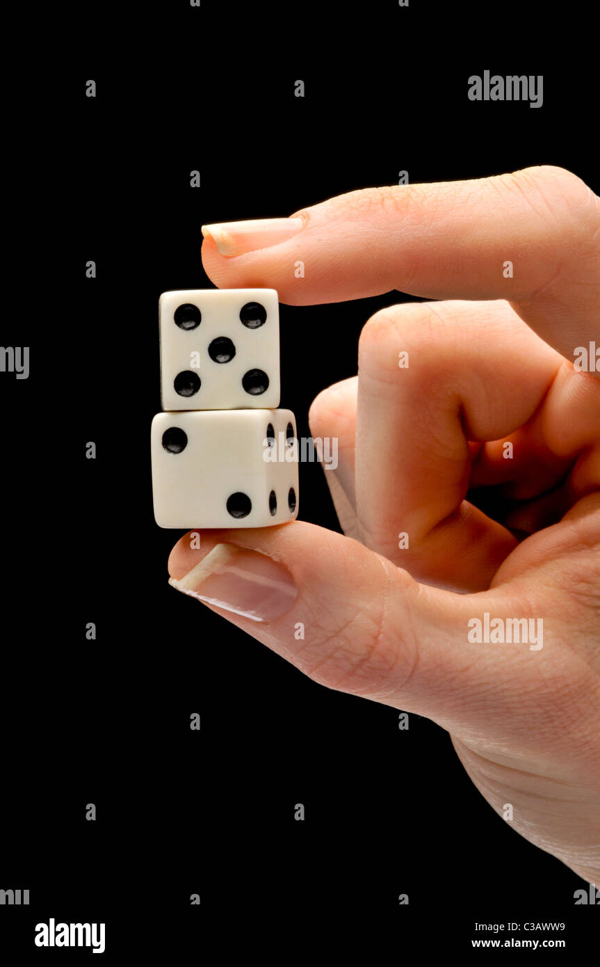 Hand with dice hi-res stock photography and images - Alamy