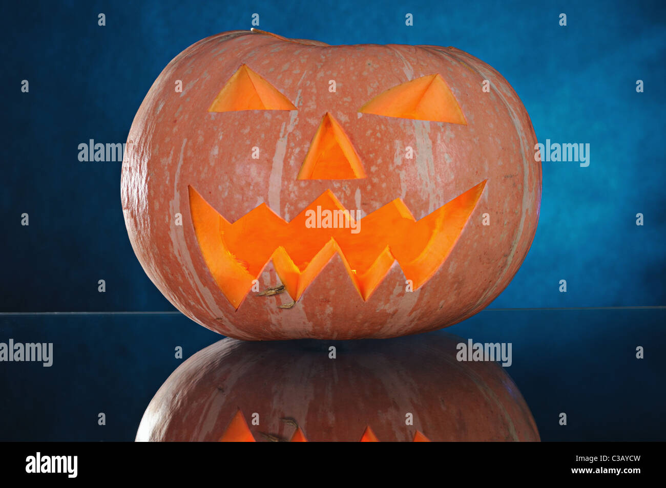 Lighting candle inside pumpkin hi-res stock photography and images - Alamy