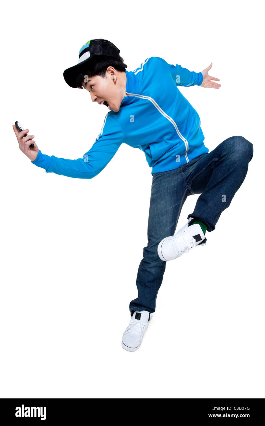 excited man jumping up with phone Stock Photo - Alamy