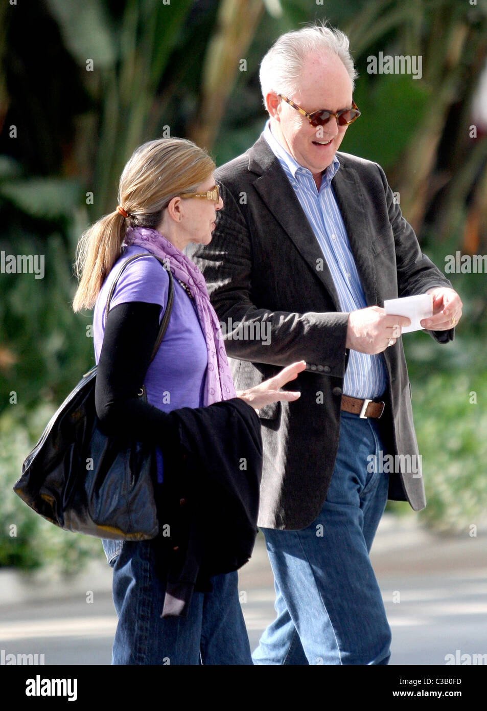Mary Yeager and John Lithgow Celebrities arrive to watch the Los ...
