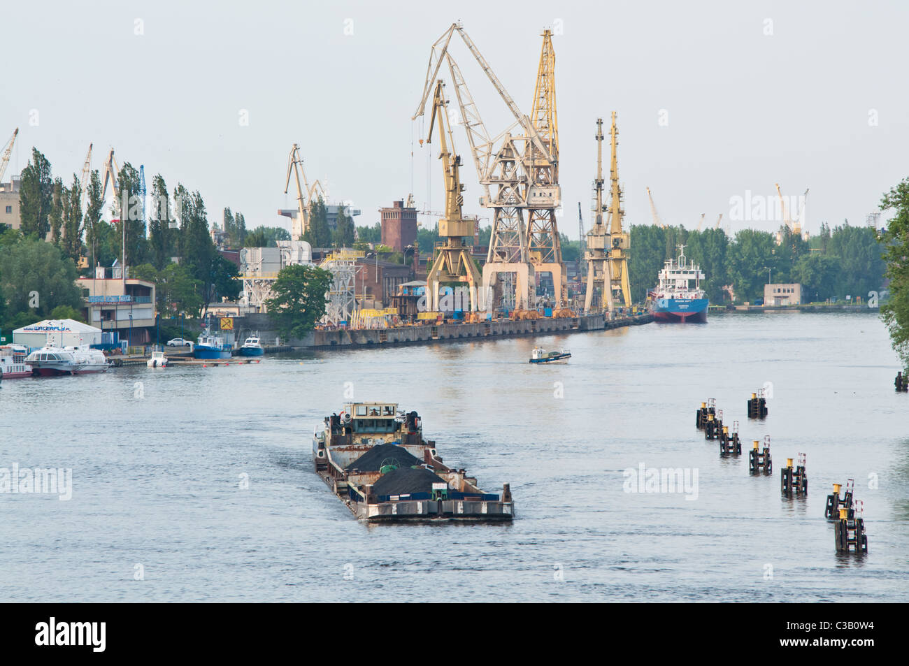 coal barge sailing on the river with cargo Stock Photo - Alamy