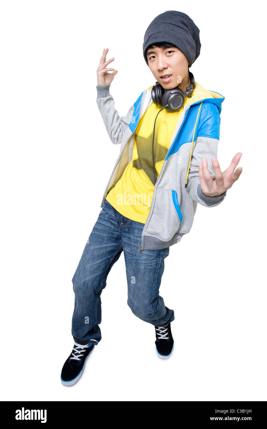 Man posing while listening to music Stock Photo - Alamy