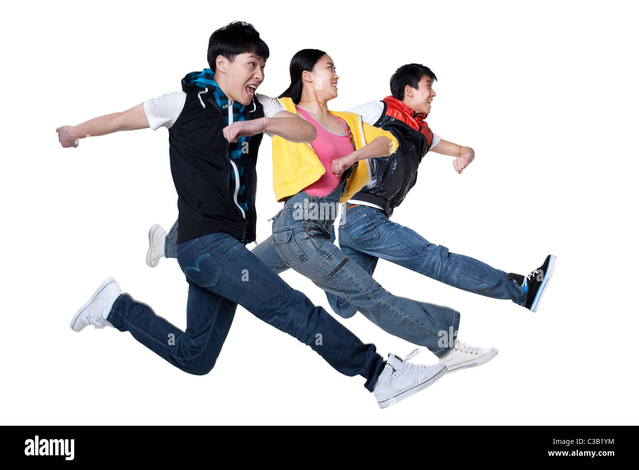 Three Friends Running Stock Photo - Alamy