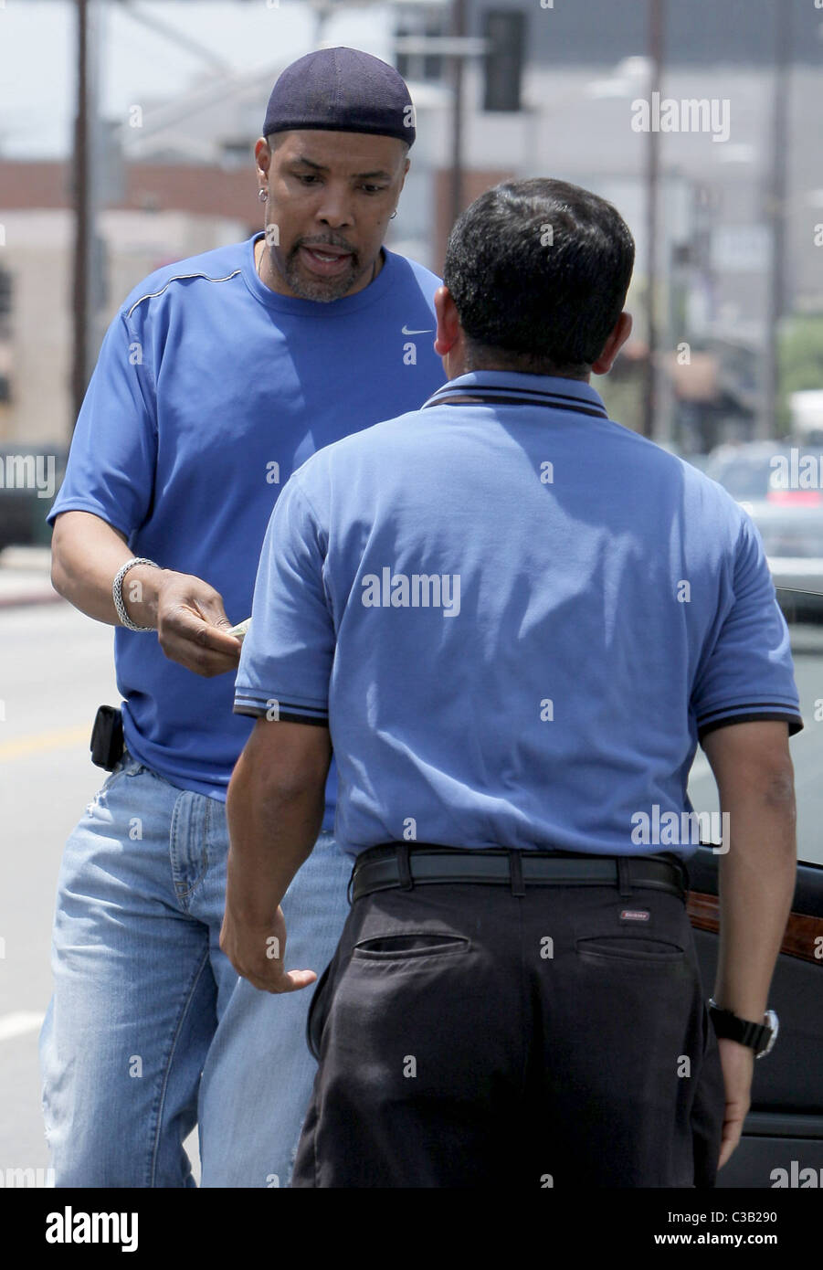 Paparazzi backwards cap hi-res stock photography and images - Alamy